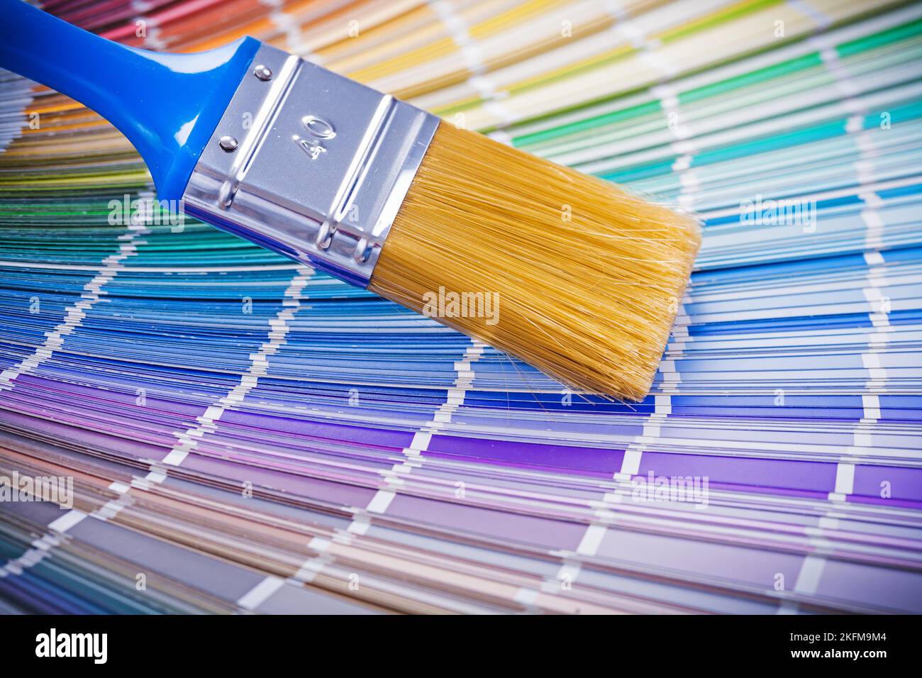 paint brush on color palette close up view Stock Photo - Alamy
