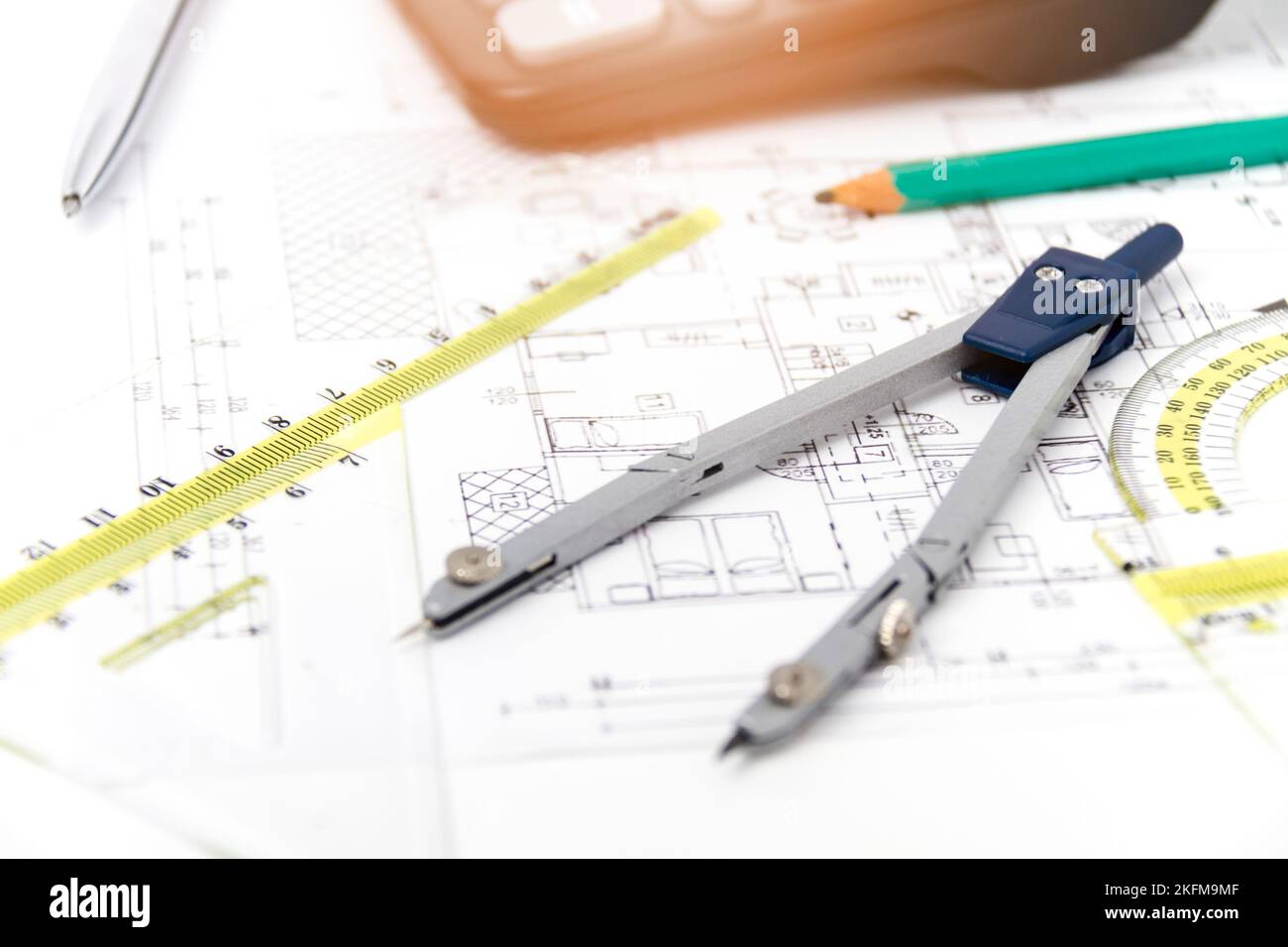 Designing a building or architecture with a ruler, pen, pencil ...