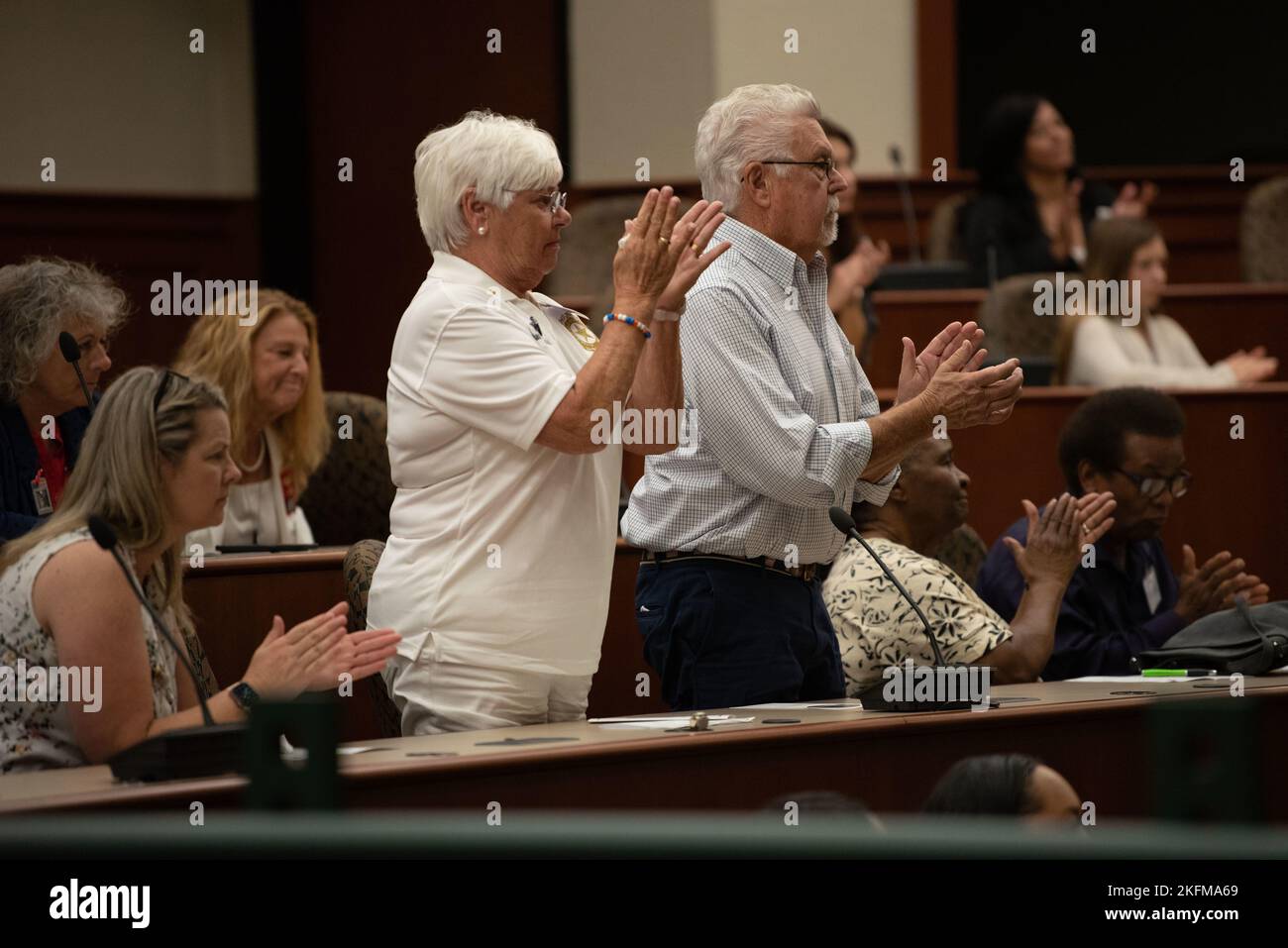 Guests in attendance of a Gold Star family event listen to a speech at ...