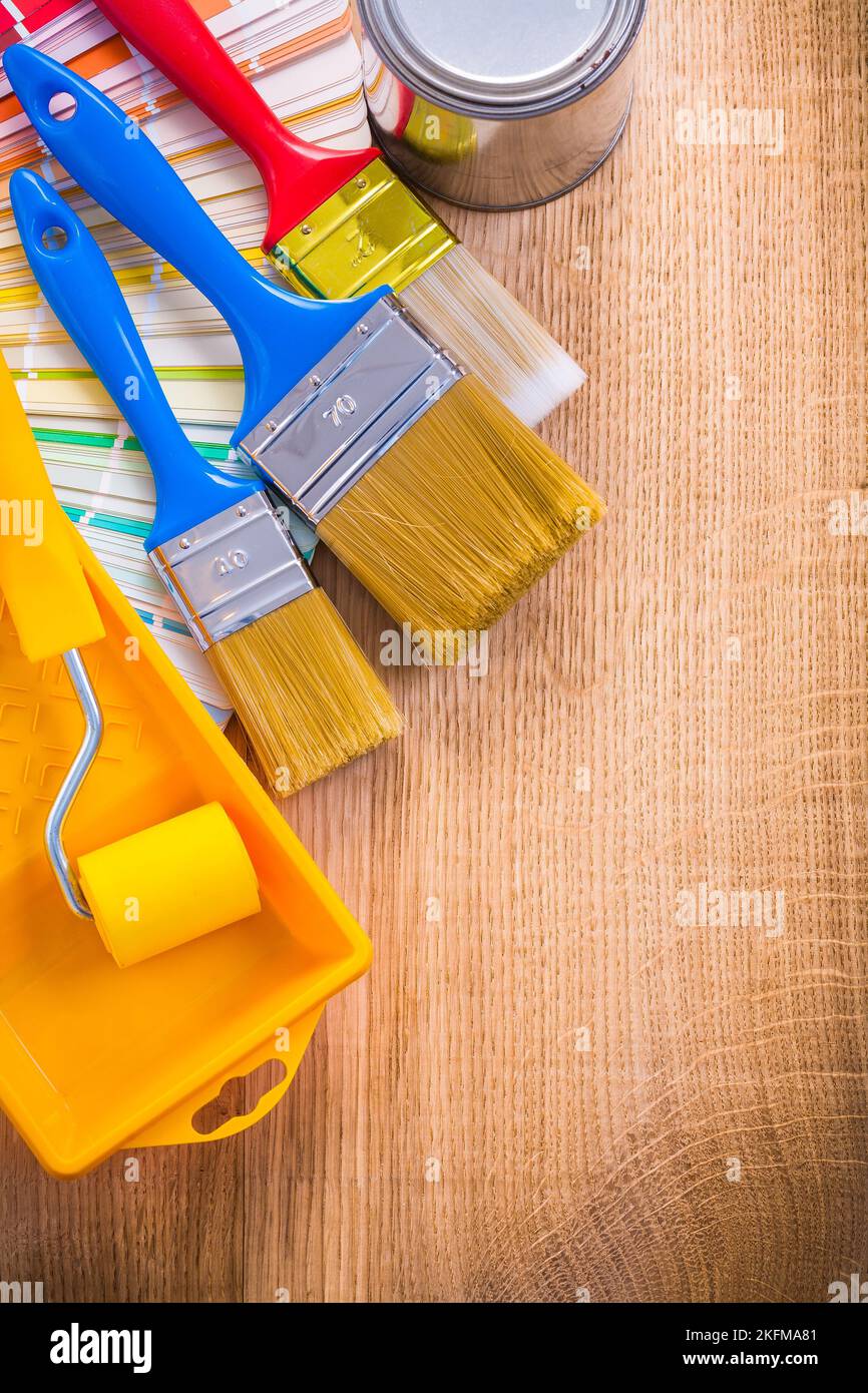 painting tools paint brush roller tray can color palette on wooden ...