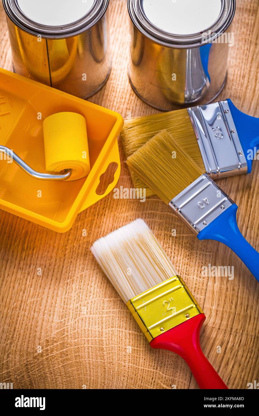painting tools paint brushes roller tray can on wooden board Stock ...