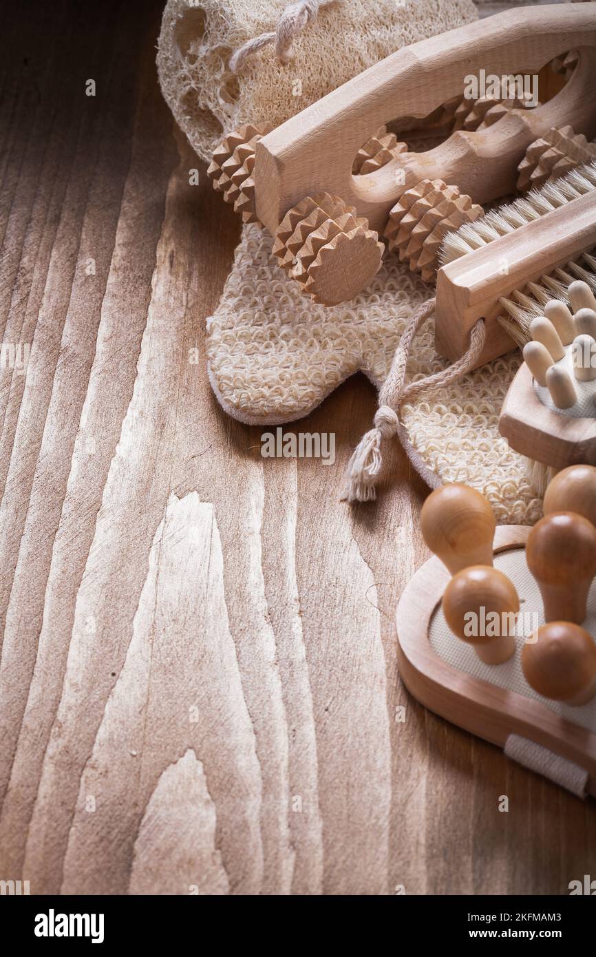 Pine vintage board with wooden massagers loofah scrubbing brush and ...