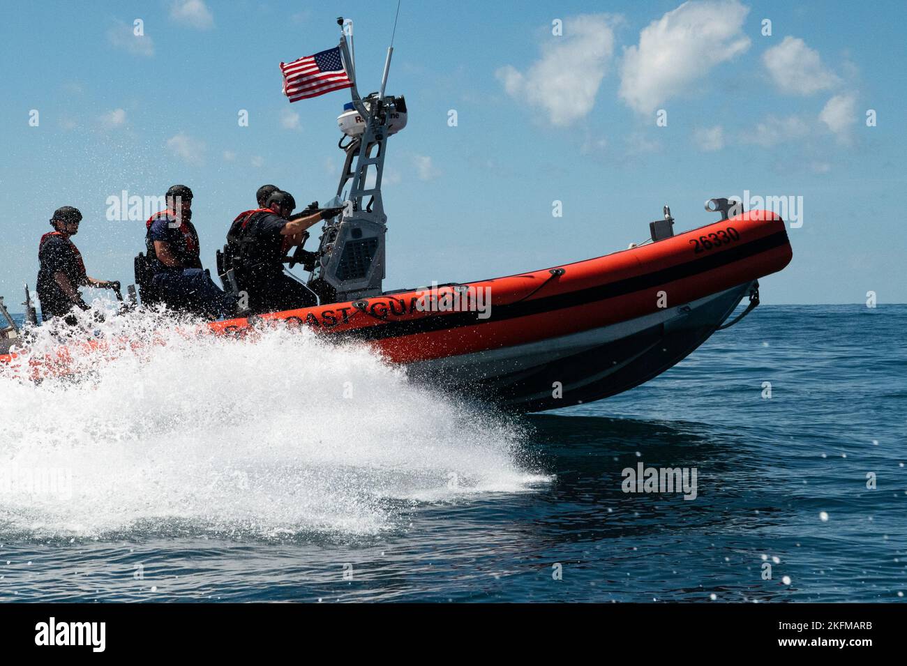 Crewmembers assigned to USCGC Hamilton (WMSL 753) conduct pursuit ...
