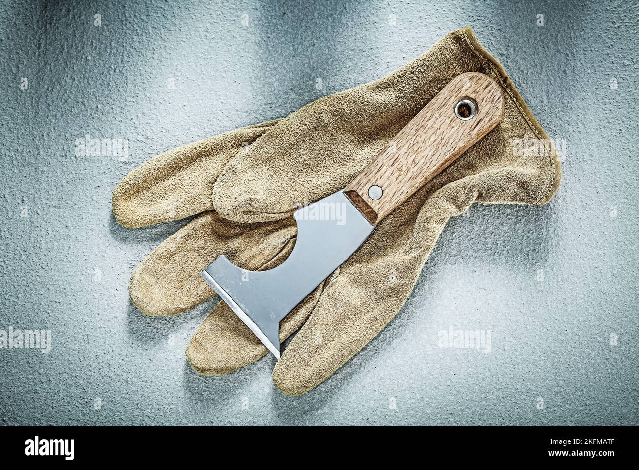 Plastering trowel safety gloves on concrete surface construction ...