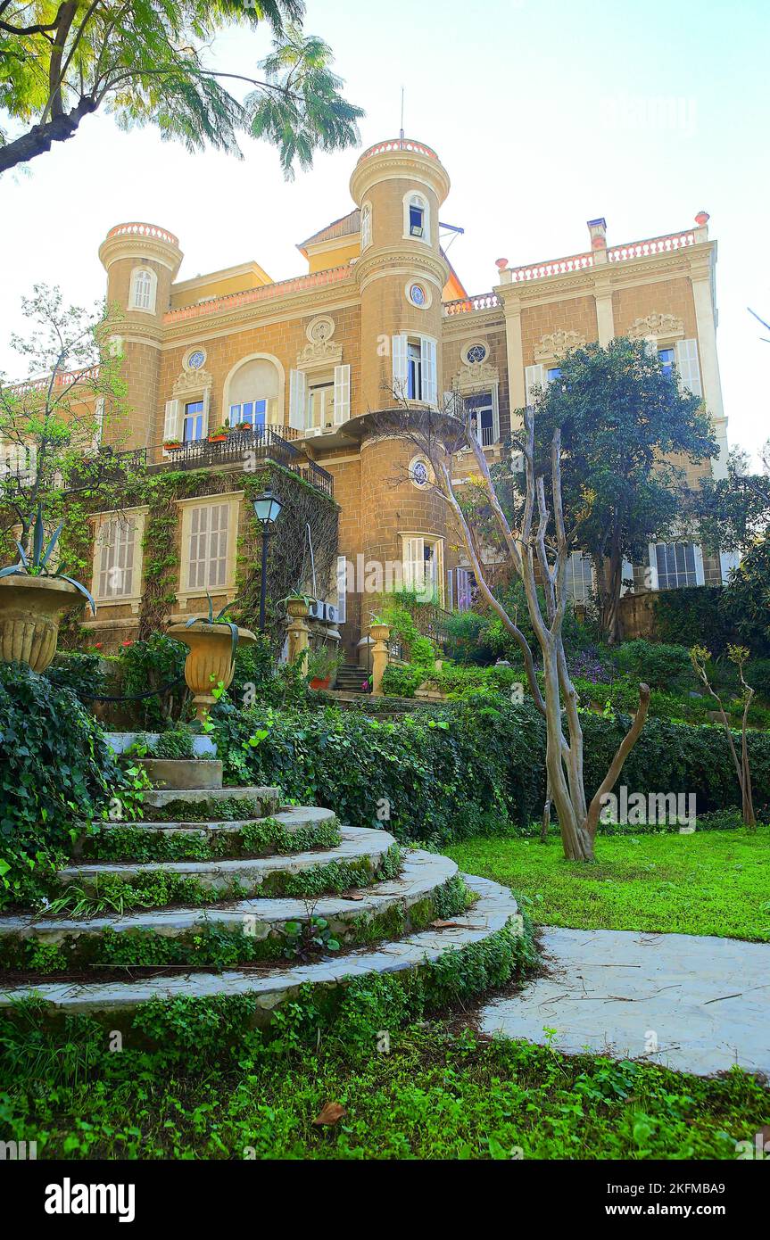 A vertical shot of the Sursock Palace with a green garden in Beirut ...