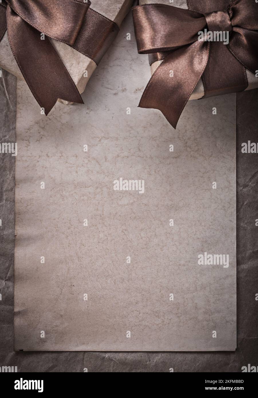 Present boxes tied bow sheet of wrapping paper celebration concept ...