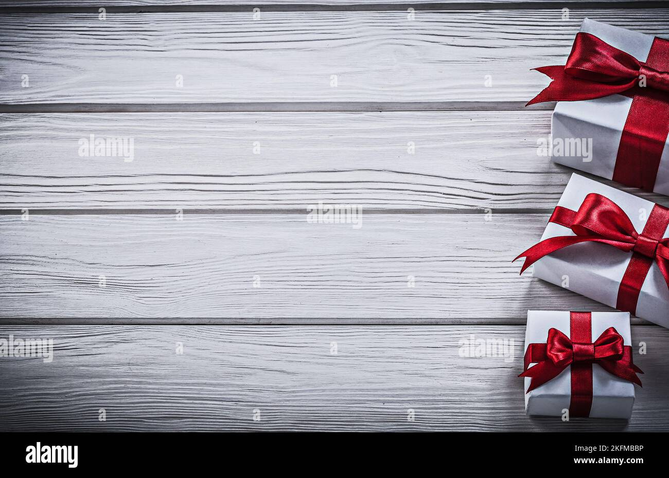 Present boxes on wooden board copy space holidays concept Stock Photo ...