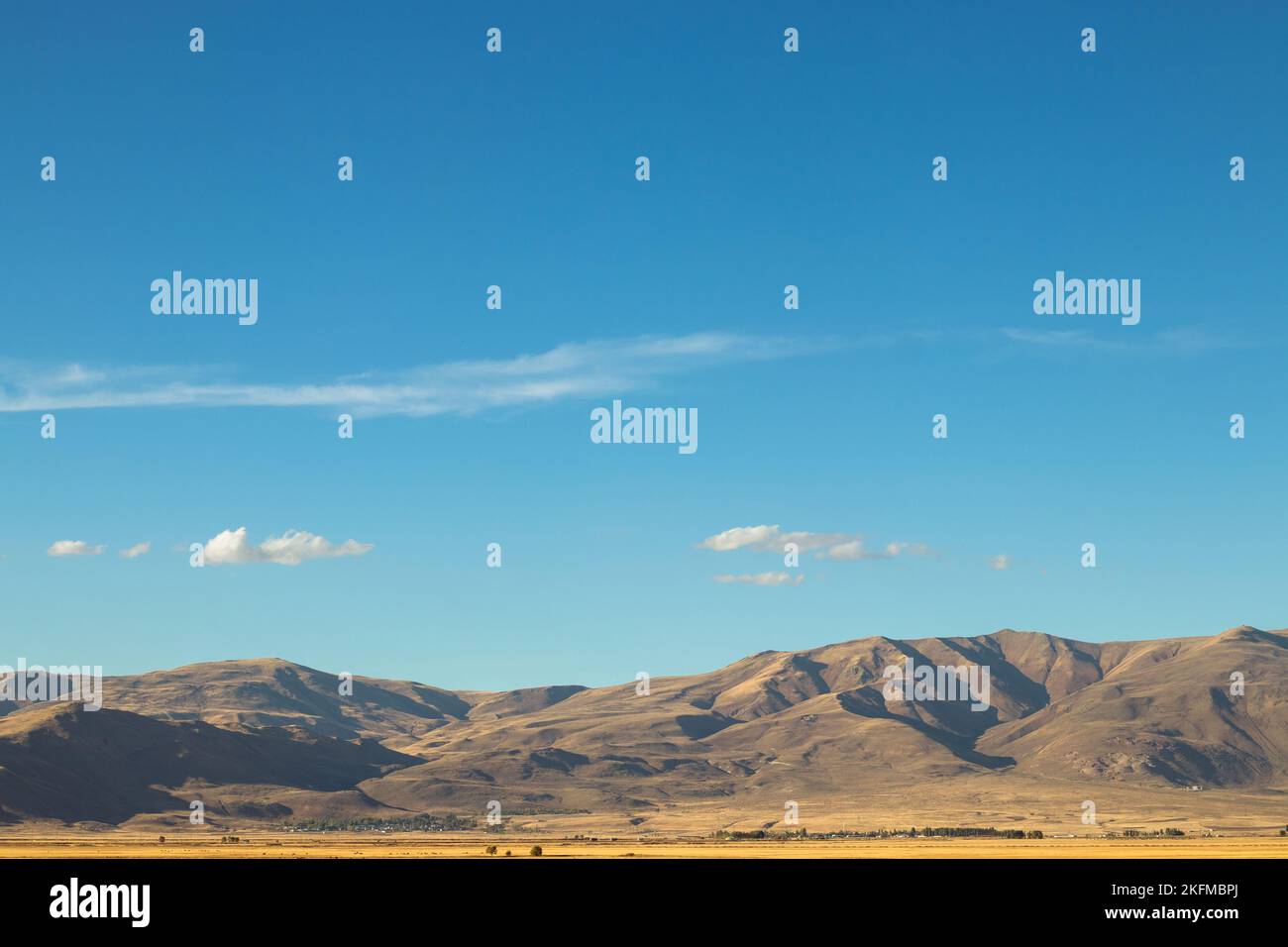 Dry ground of the plain during the summer drought. Vast fields after ...