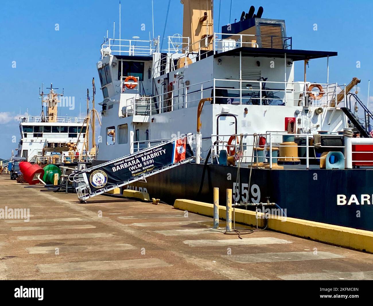 The Coast Guard Cutter Barbara Mabrity is moored next to the Coast ...