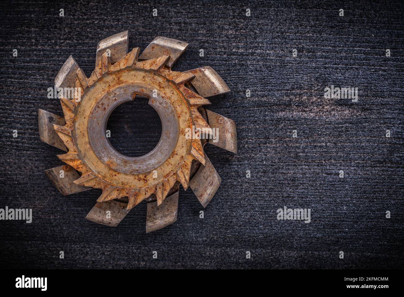 Rusty obsolete cutting tool on wooden board construction concept Stock ...