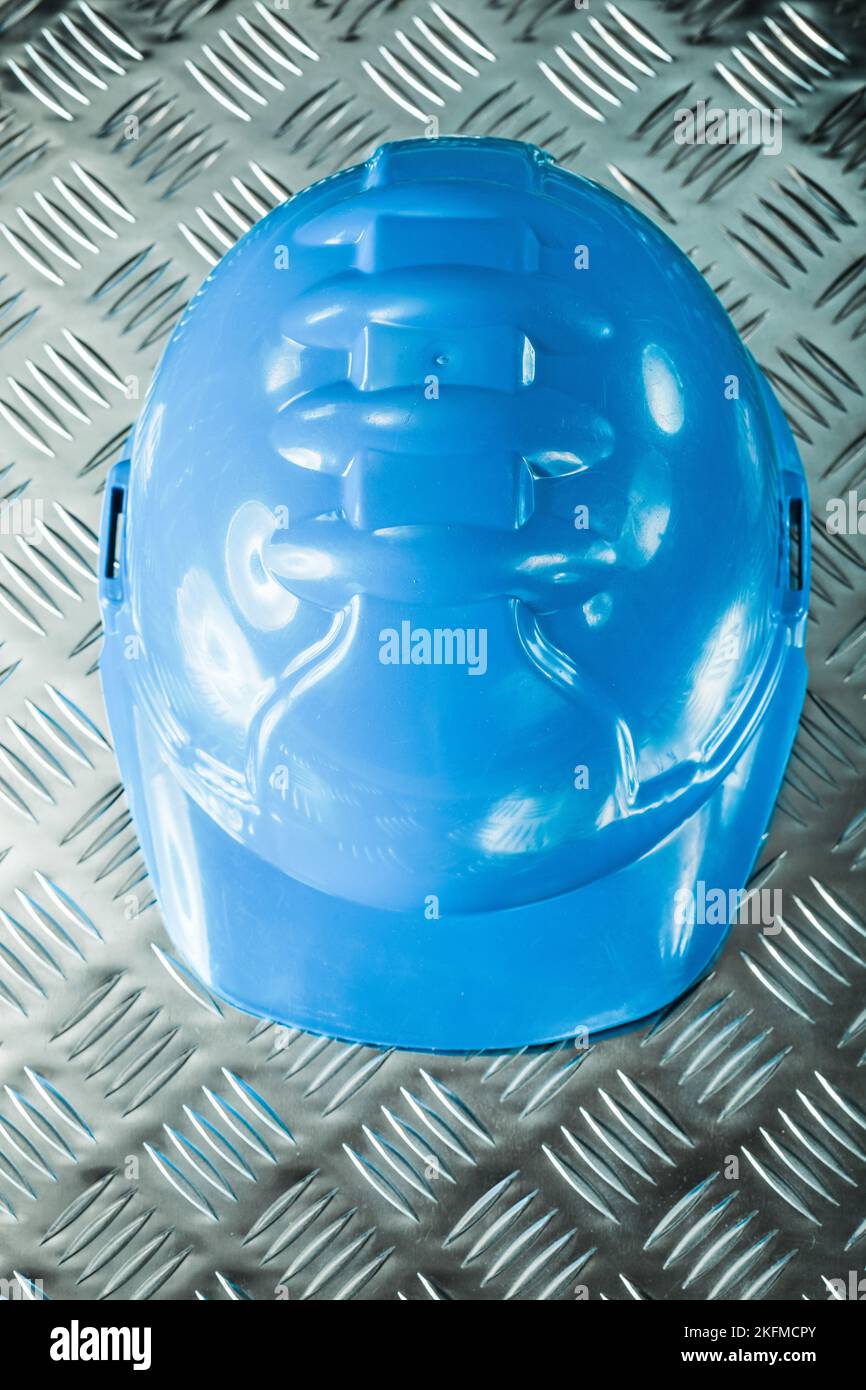 Safety building helmet on grooved metal sheet Stock Photo - Alamy