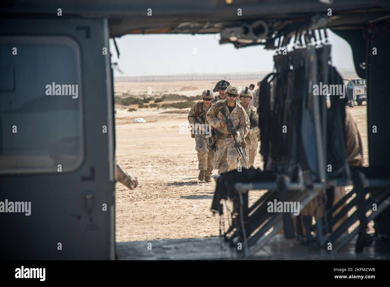 U.S. Marines with 3rd Battalion, 5th Marine Regiment, 1st Marine Division, board a United Arab ...