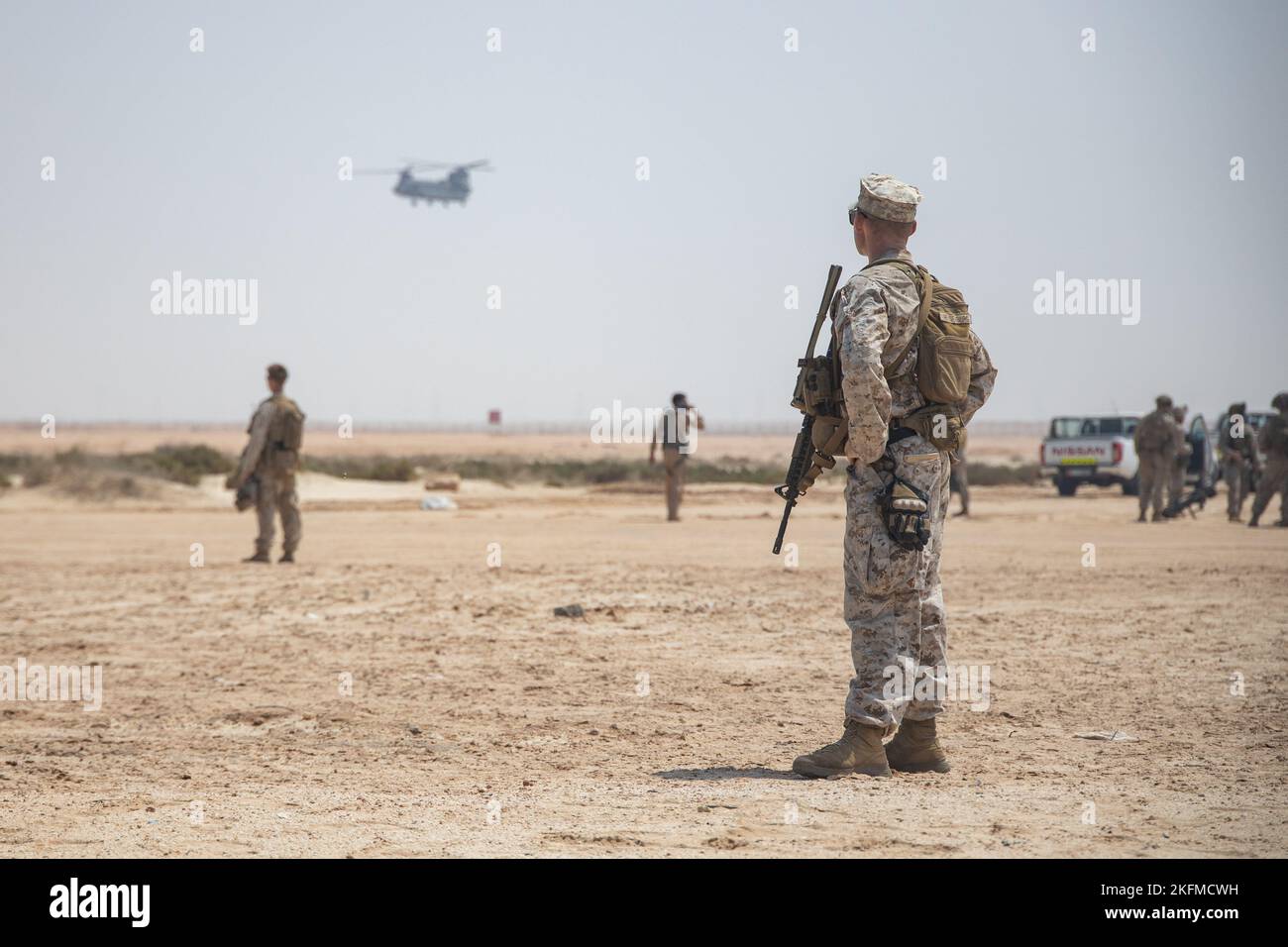 A U.S. Marine with 3rd Battalion, 5th Marine Regiment, 1st Marine Division, observes a United ...
