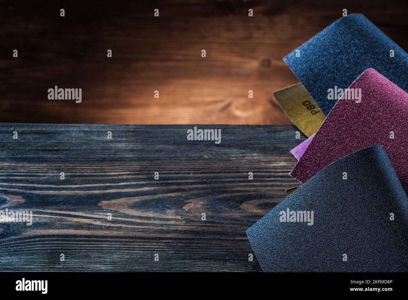 sand paper sheets on vintage dark wood' Stock Photo - Alamy