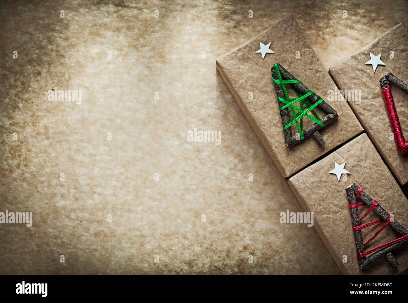 Set of Christmas gift boxes on crumpled vintage paper Stock Photo - Alamy