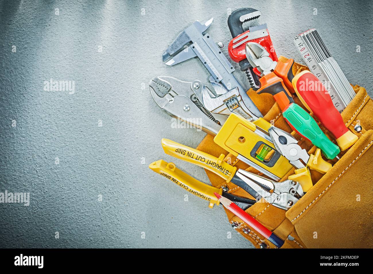 Set of construction tooling in tool belt Stock Photo - Alamy