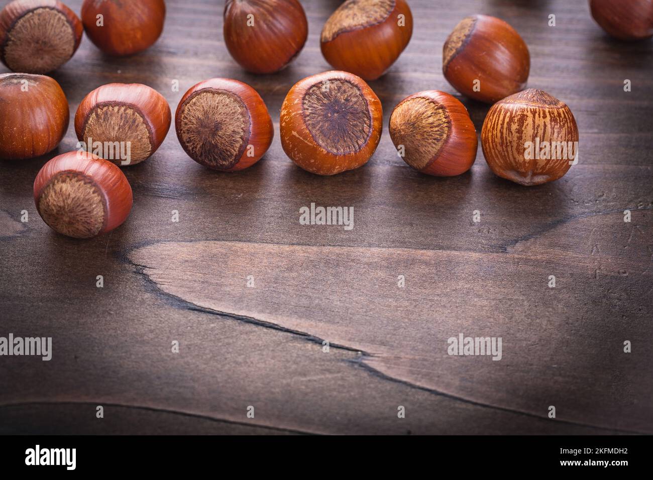 set of hazelnuts on vintage wooden board food and drink concept Stock ...