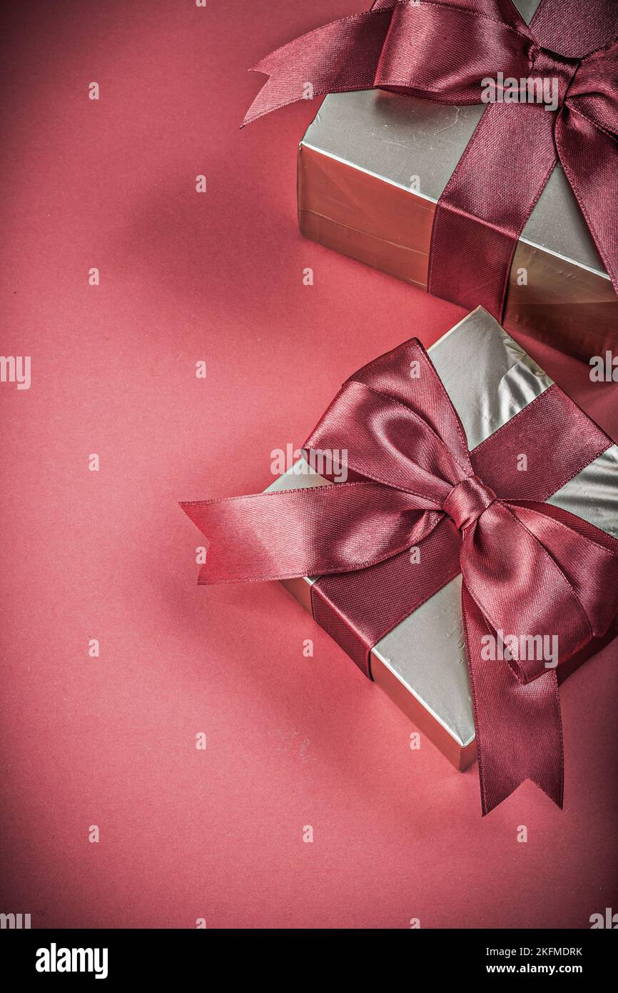 Present boxes on red hi-res stock photography and images - Alamy