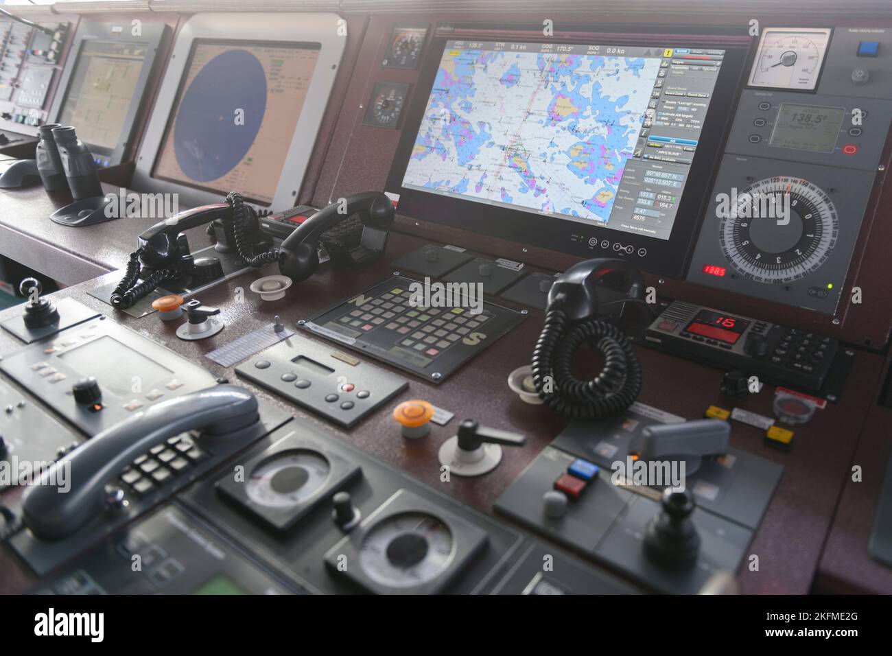 Navigational control panel and VHF radio. Working on the ship's ...