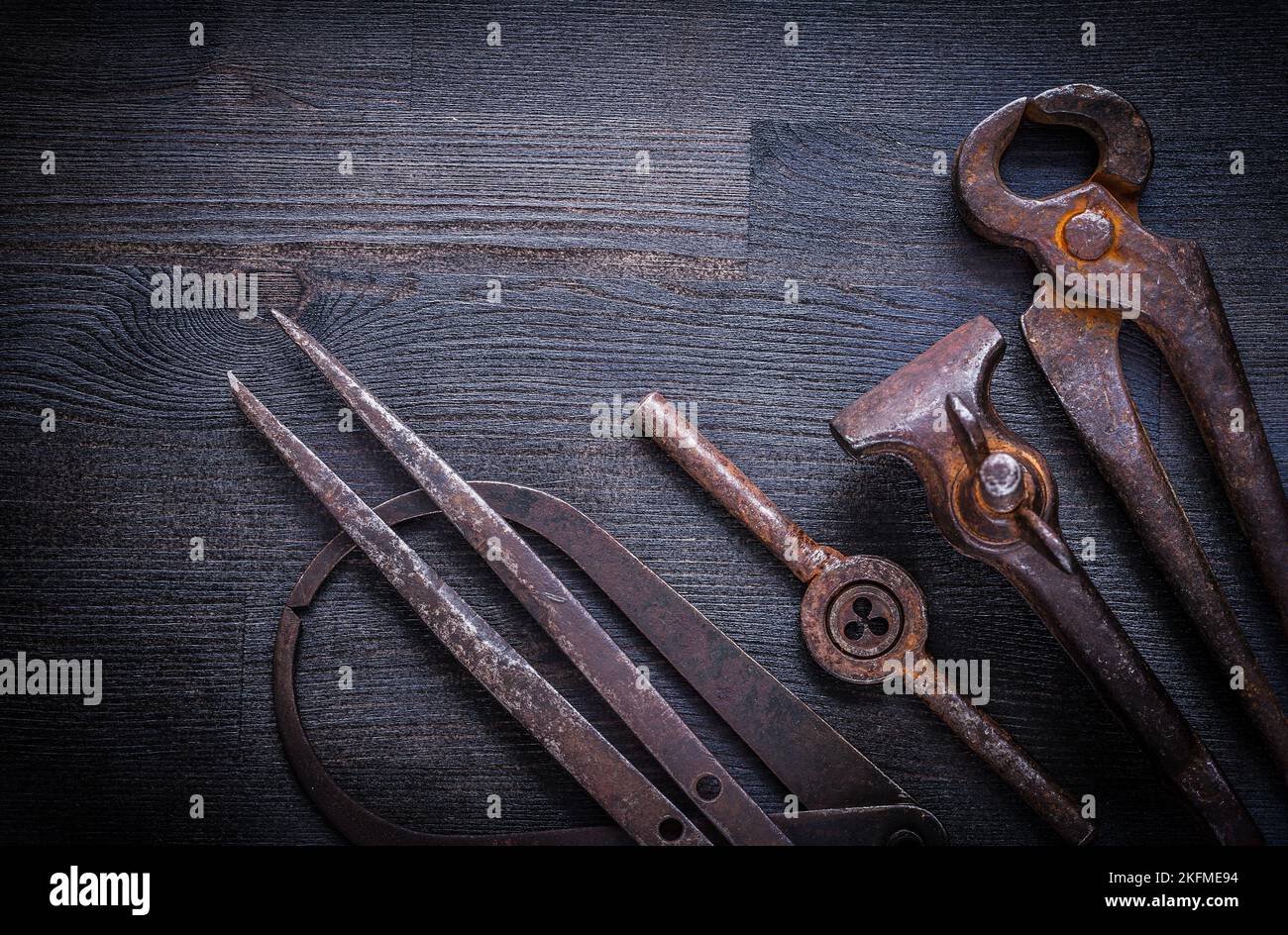 set of vintage tools on wood board Stock Photo - Alamy