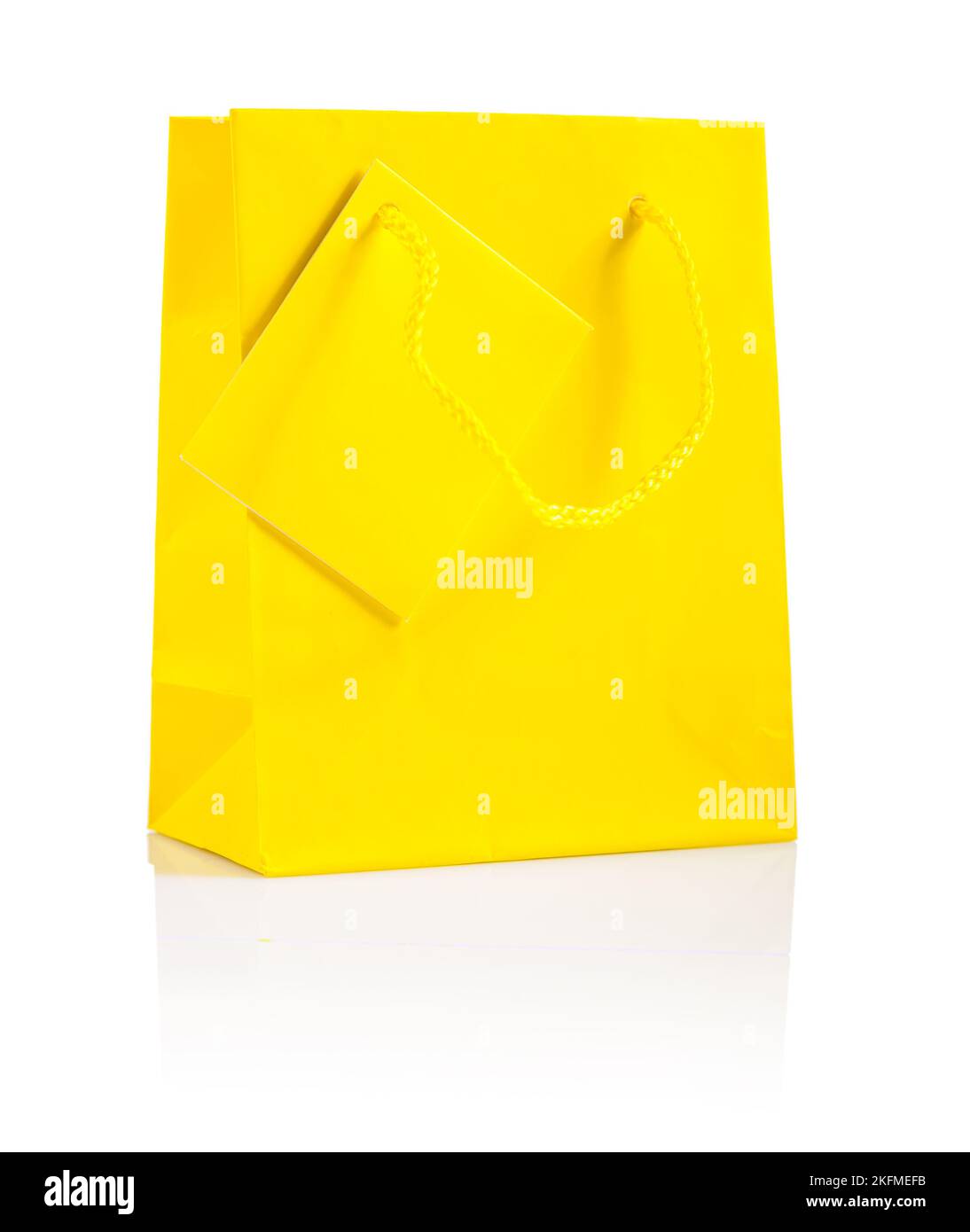 single yellow paper bag Stock Photo - Alamy
