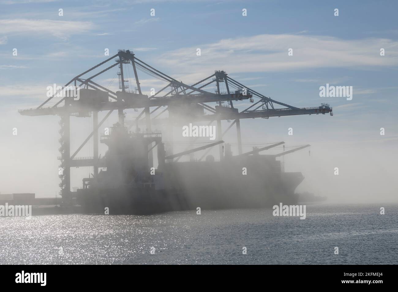 Container ship in port, strong fog. Foggy weather. Bad visibility Stock ...