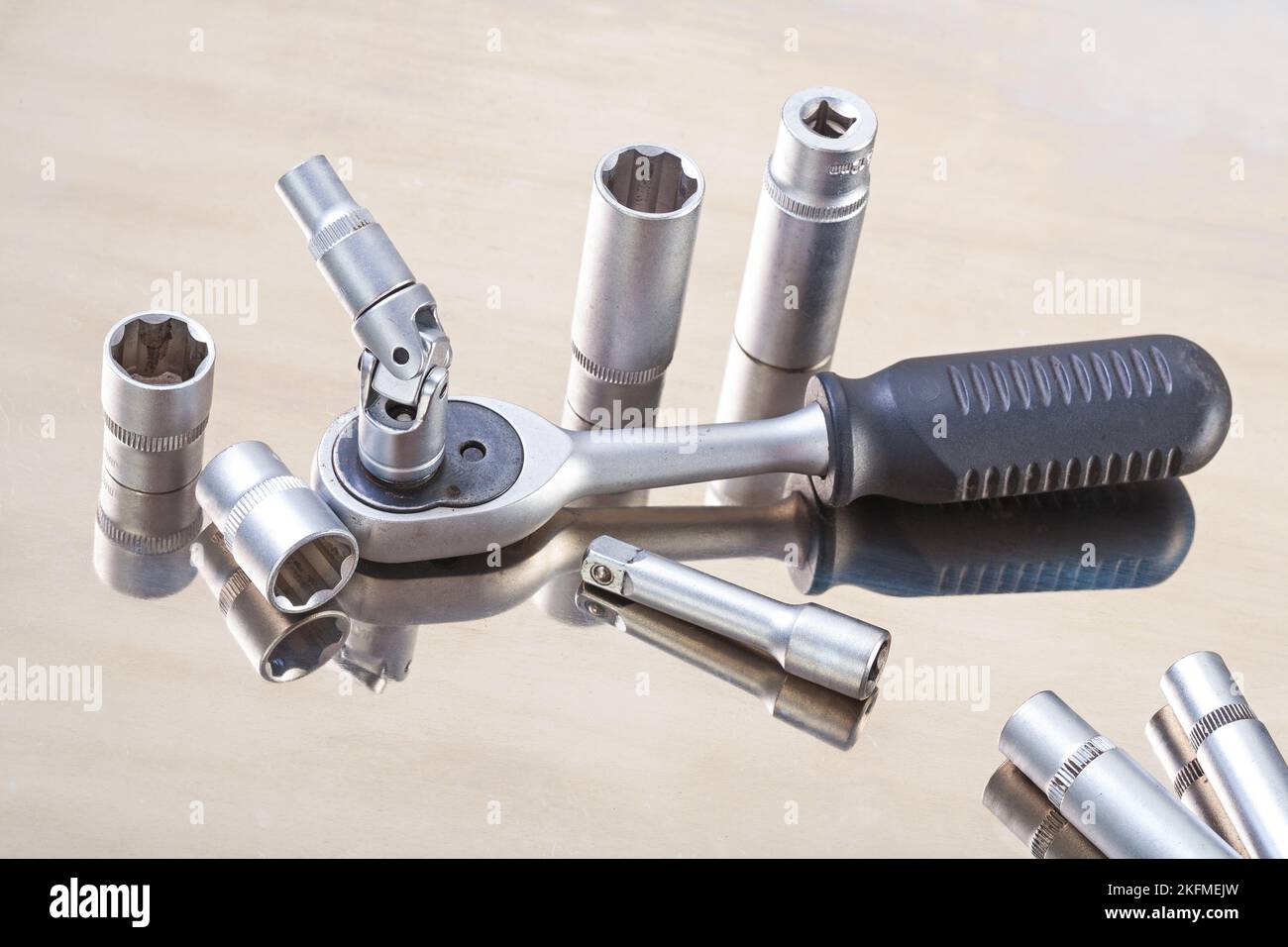 Socket spanner with a black handle and torx on a mirror Stock Photo - Alamy