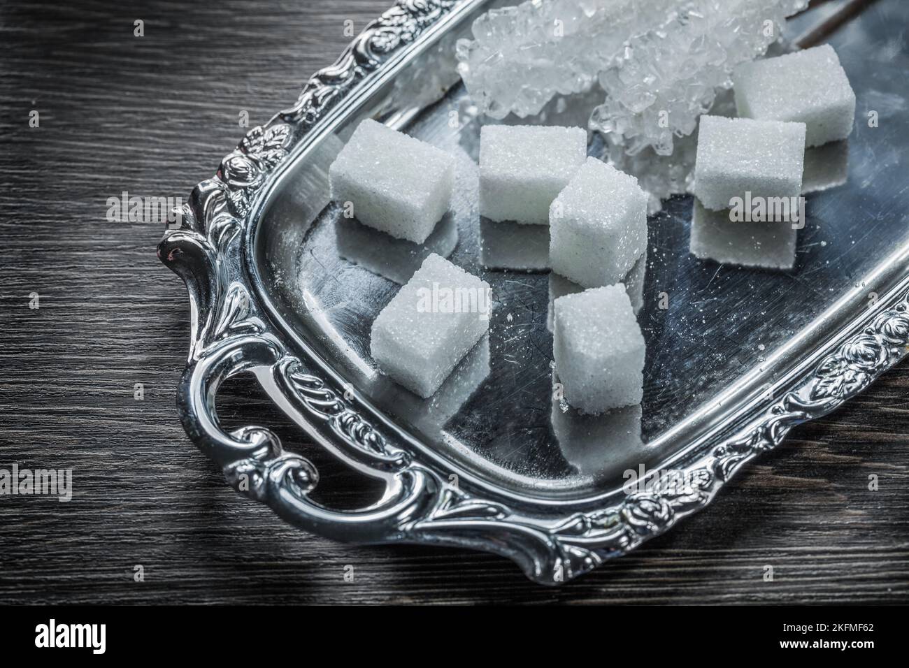Sugar cubes sticks on tray Stock Photo - Alamy