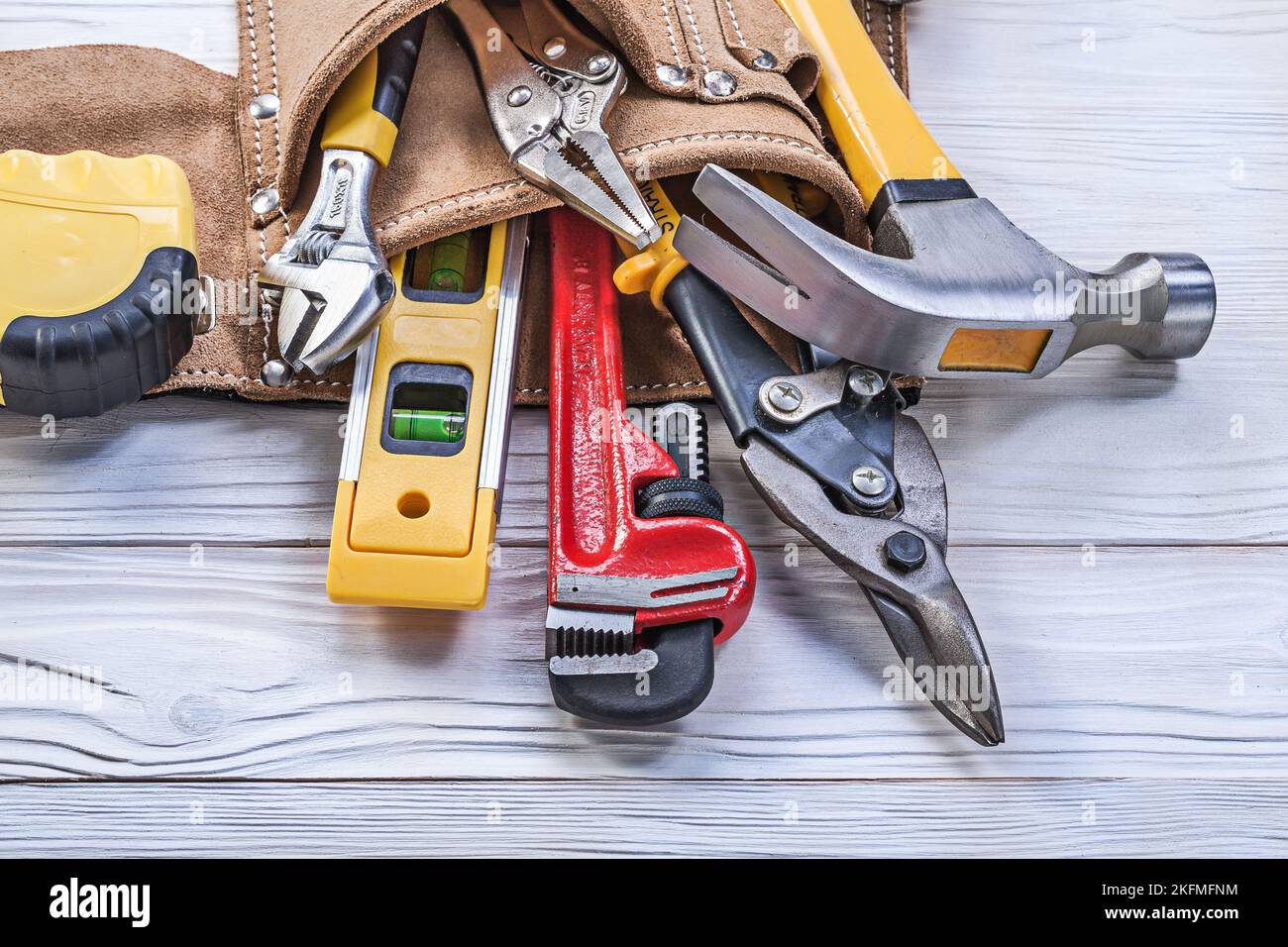 Tool belt pliers construction level tape line claw hammer pipe wrench ...