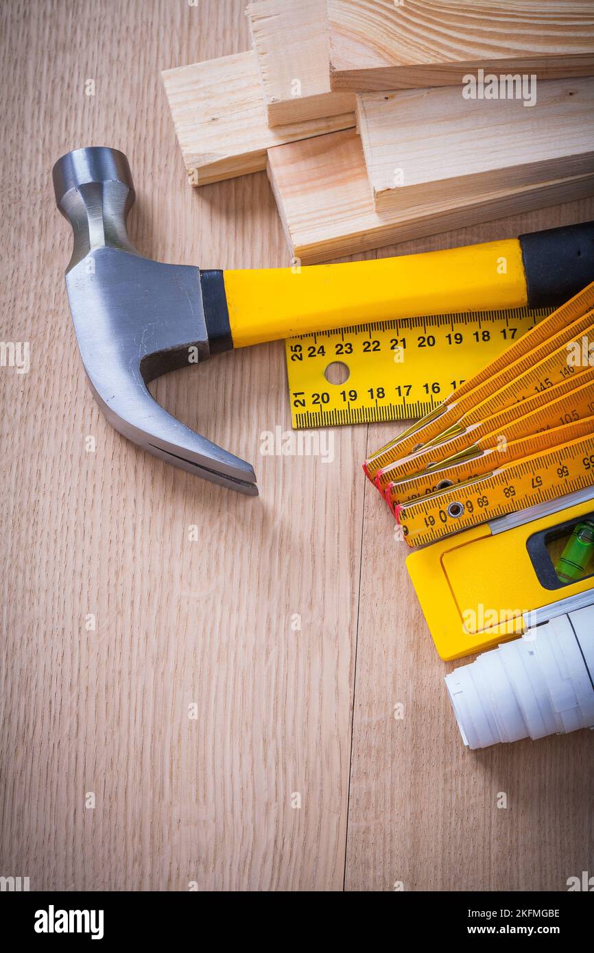 Variety of building objects for maintenance works on wooden surface ...