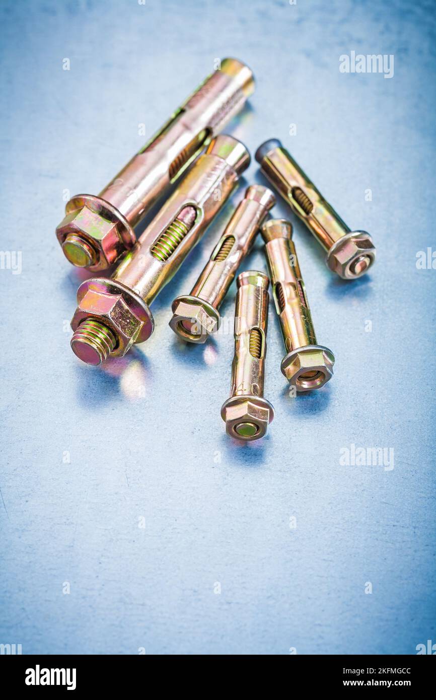 Vertical view anchor bolts for concrete walls and nuts on metallic ...