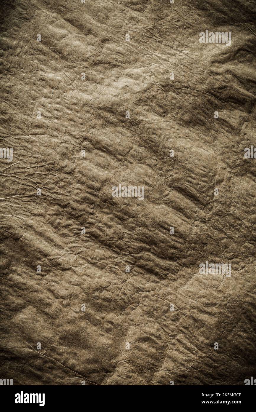 vertical general view crumpled vintage brown paper texture close up ...