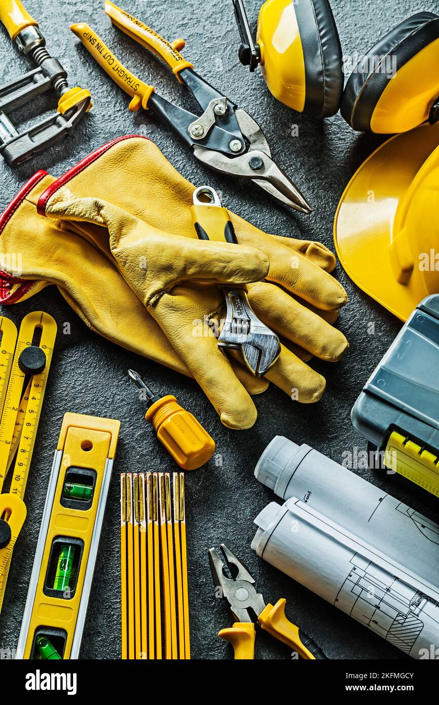 vertical version big set of construction tools with gloves in centre on ...