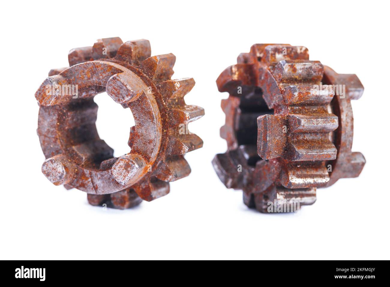 very old dusted and rusted machine cogwheels isolated on white ...