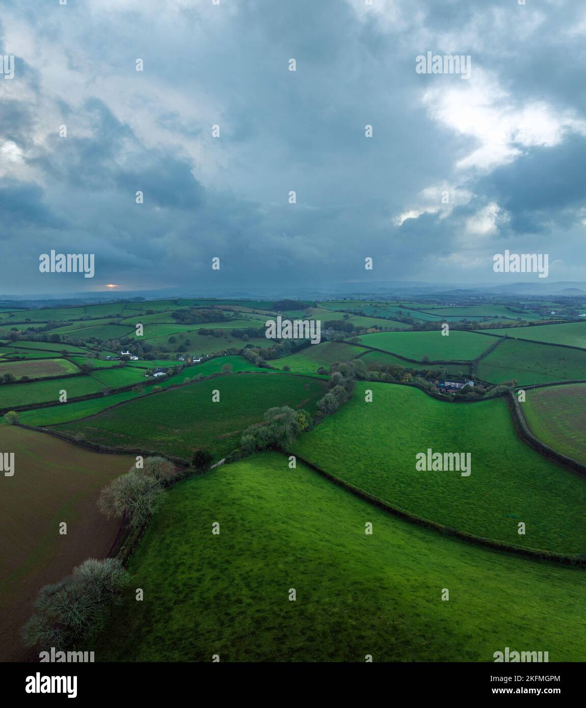 Fields and Farms over Cockington from a drone, Paignton, Torquay, Devon ...