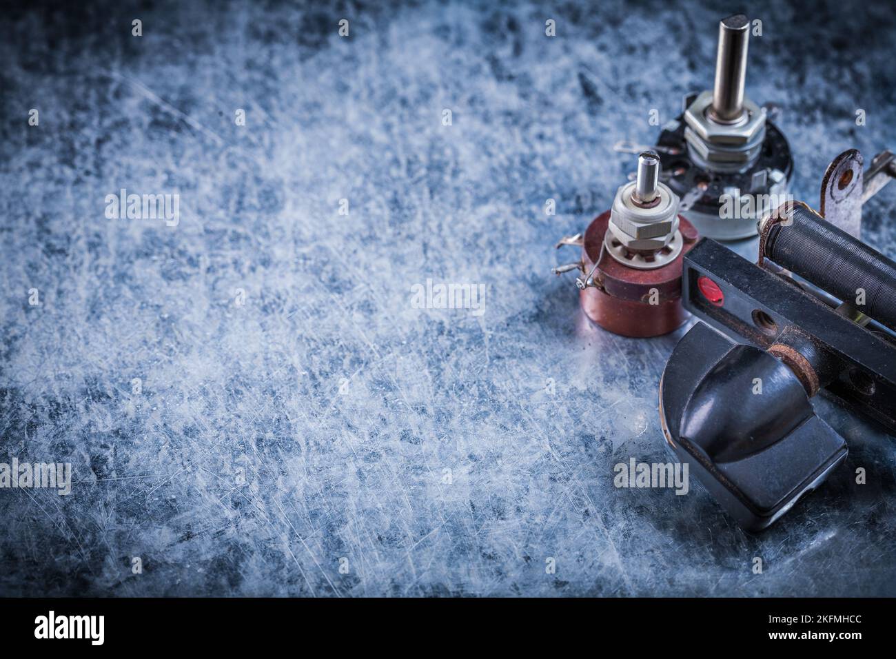 Vintage resistor toggles on metallic surface copy space electricity ...