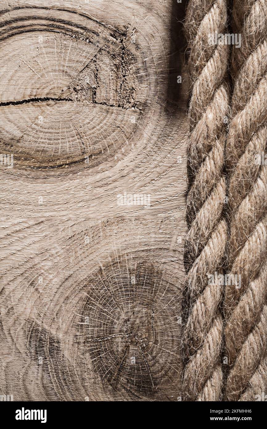 Vintage spirally twisted flax ropes on wooden board top view Stock ...