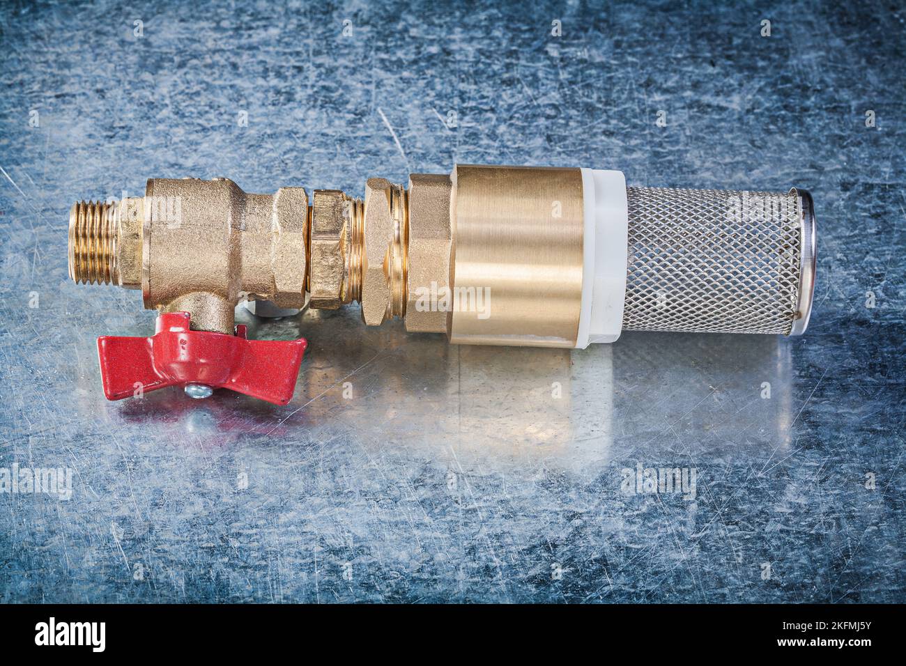 Water gate valve with strainer filter on metallic background ...