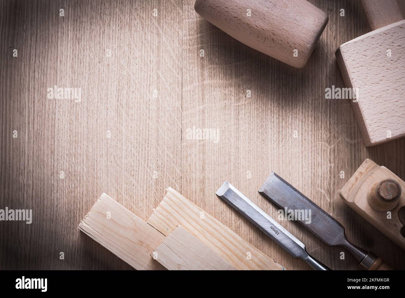 Wooden bricks mallets planner flat chisels on wood background ...