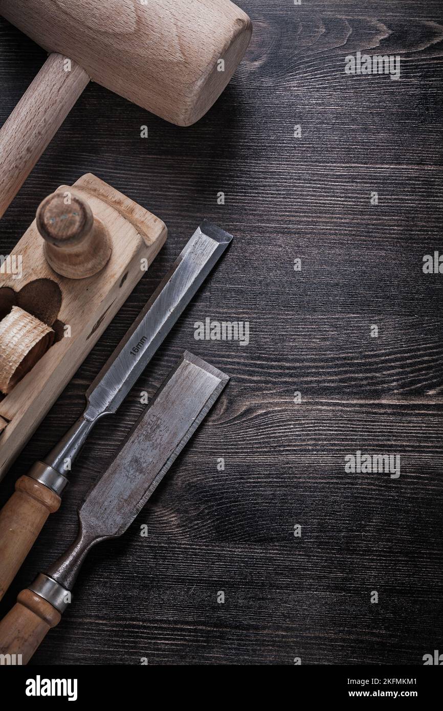 Wooden mallet flat chisels shaving plane on wood board Stock Photo - Alamy