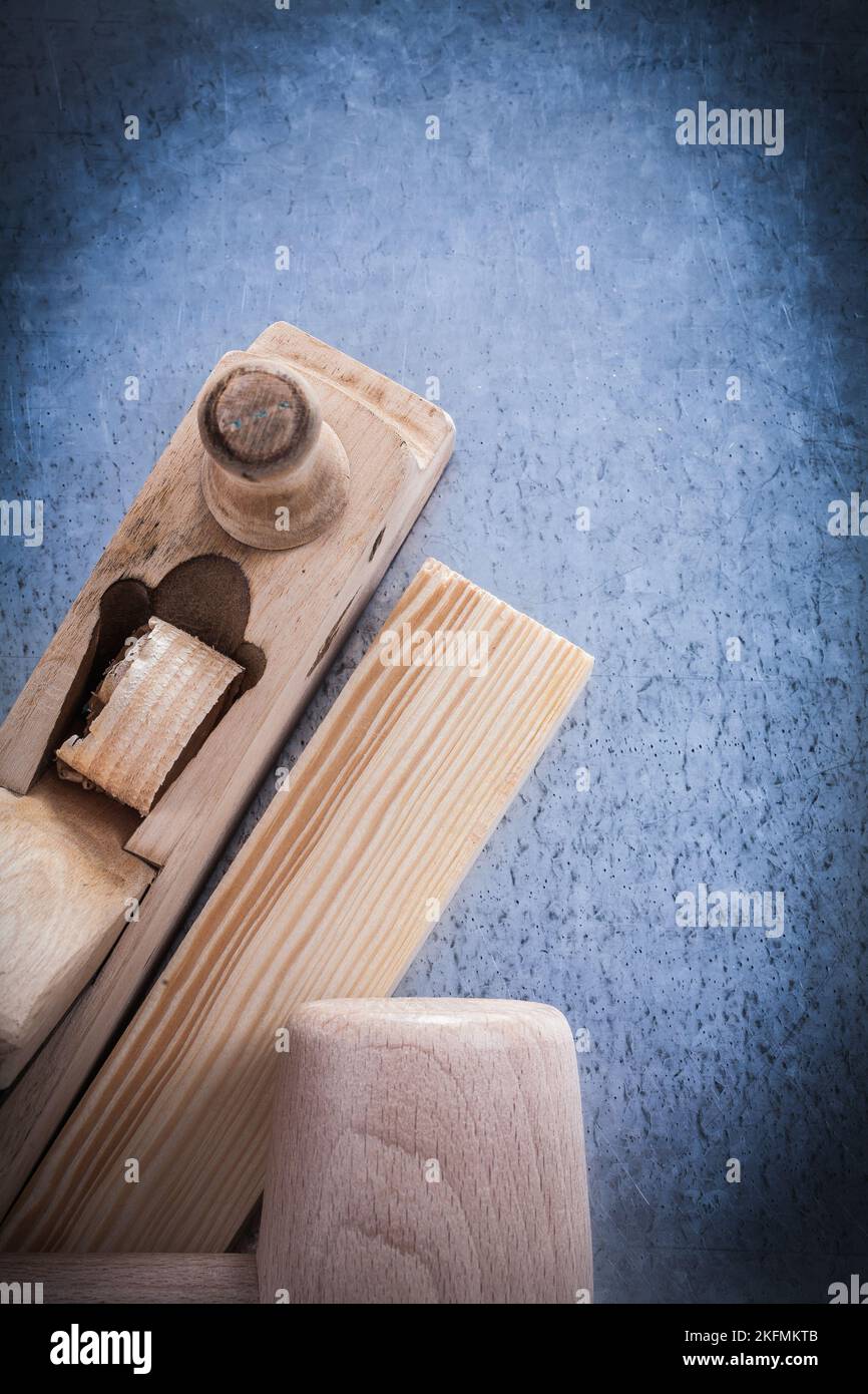 Wooden shaving plane mallet brick on scratched metallic surface Stock ...
