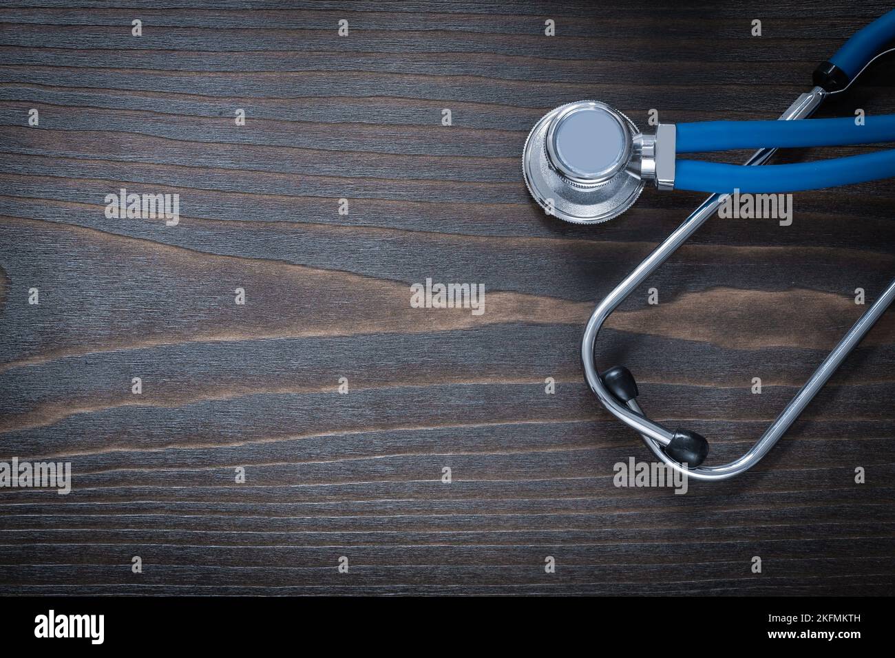 Wooden vintage board with blue medical diagnostic device medicine ...