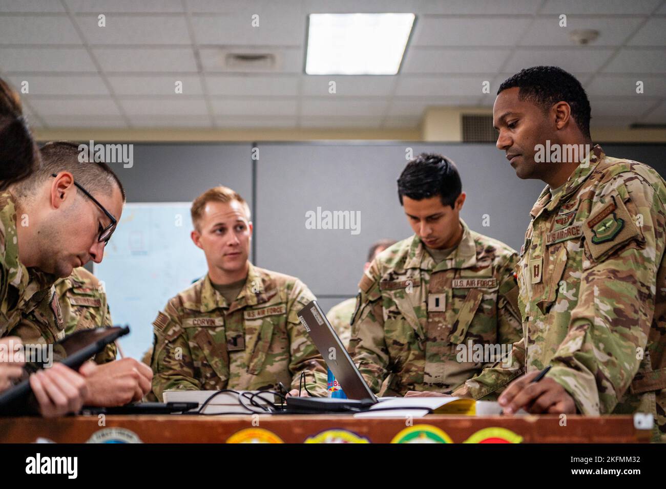 U.S. Air Force Capt. Alex Reynolds, right, 21st Airlift Squadron C-17 ...