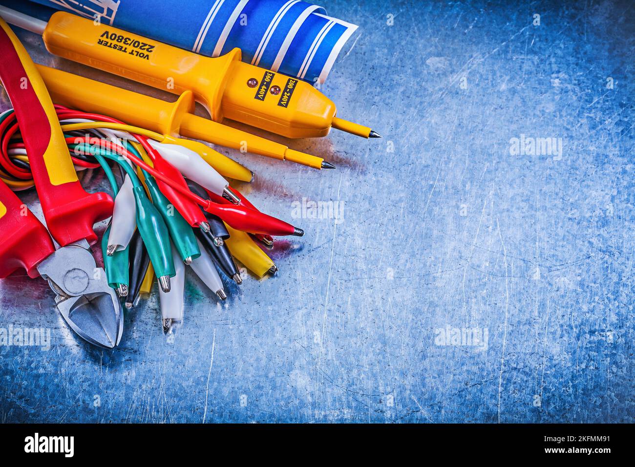 Yellow electrical tester crocodile clip cables blue construction plans ...