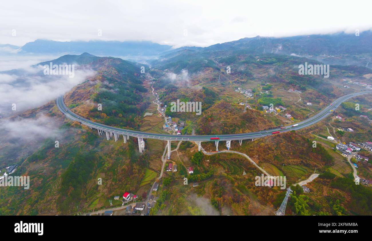 ANQING, CHINA - NOVEMBER 19, 2022 - A highway passes through a village ...
