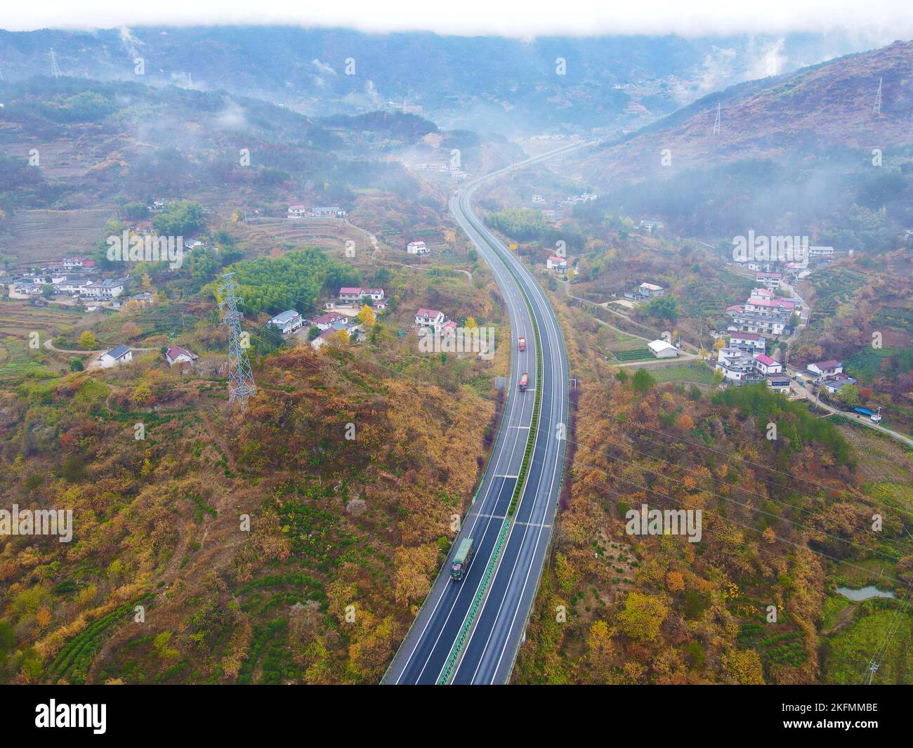 ANQING, CHINA - NOVEMBER 19, 2022 - A highway passes through a village ...