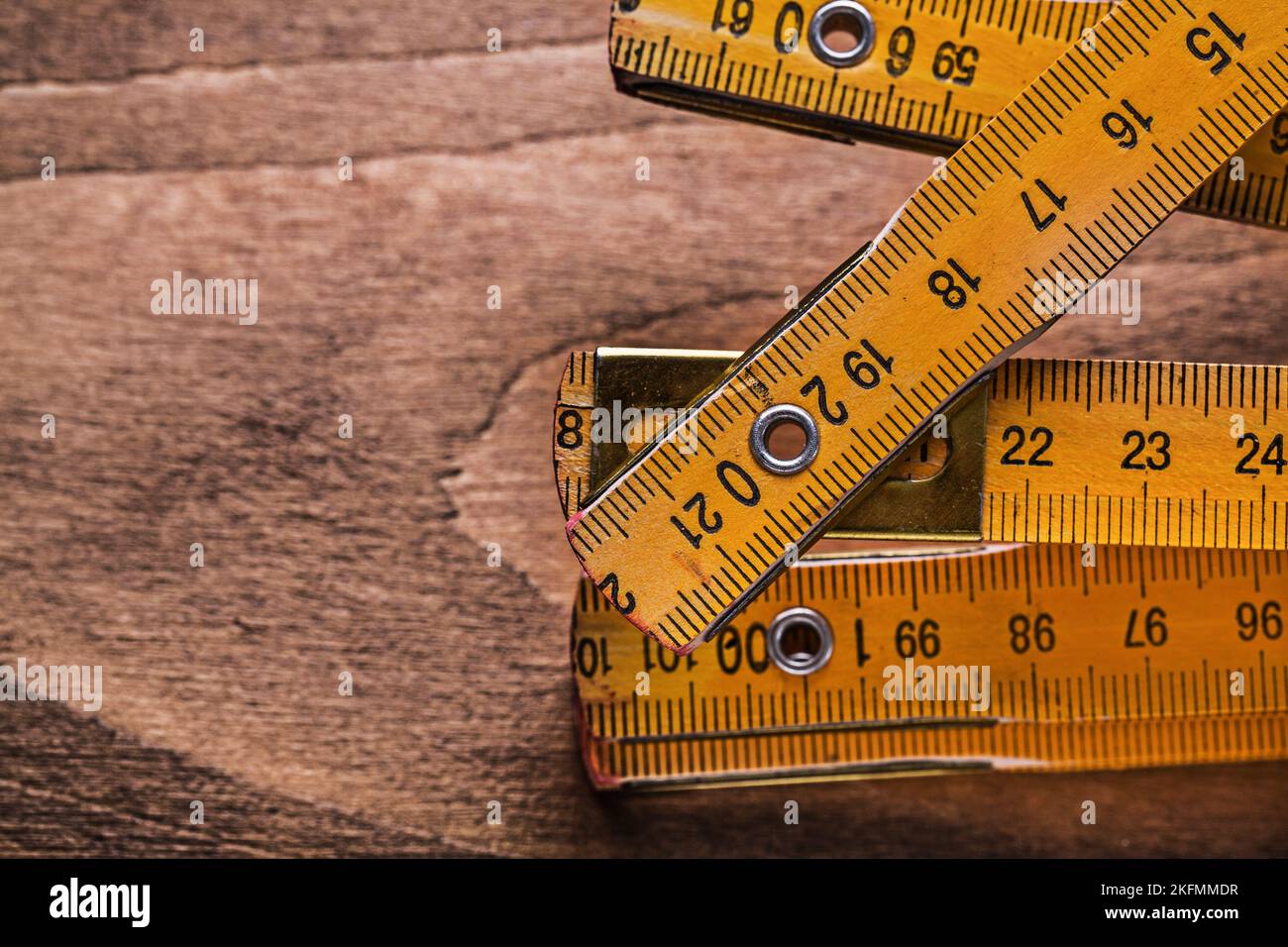 Yellow wooden meter on wood board top view construction concept Stock ...
