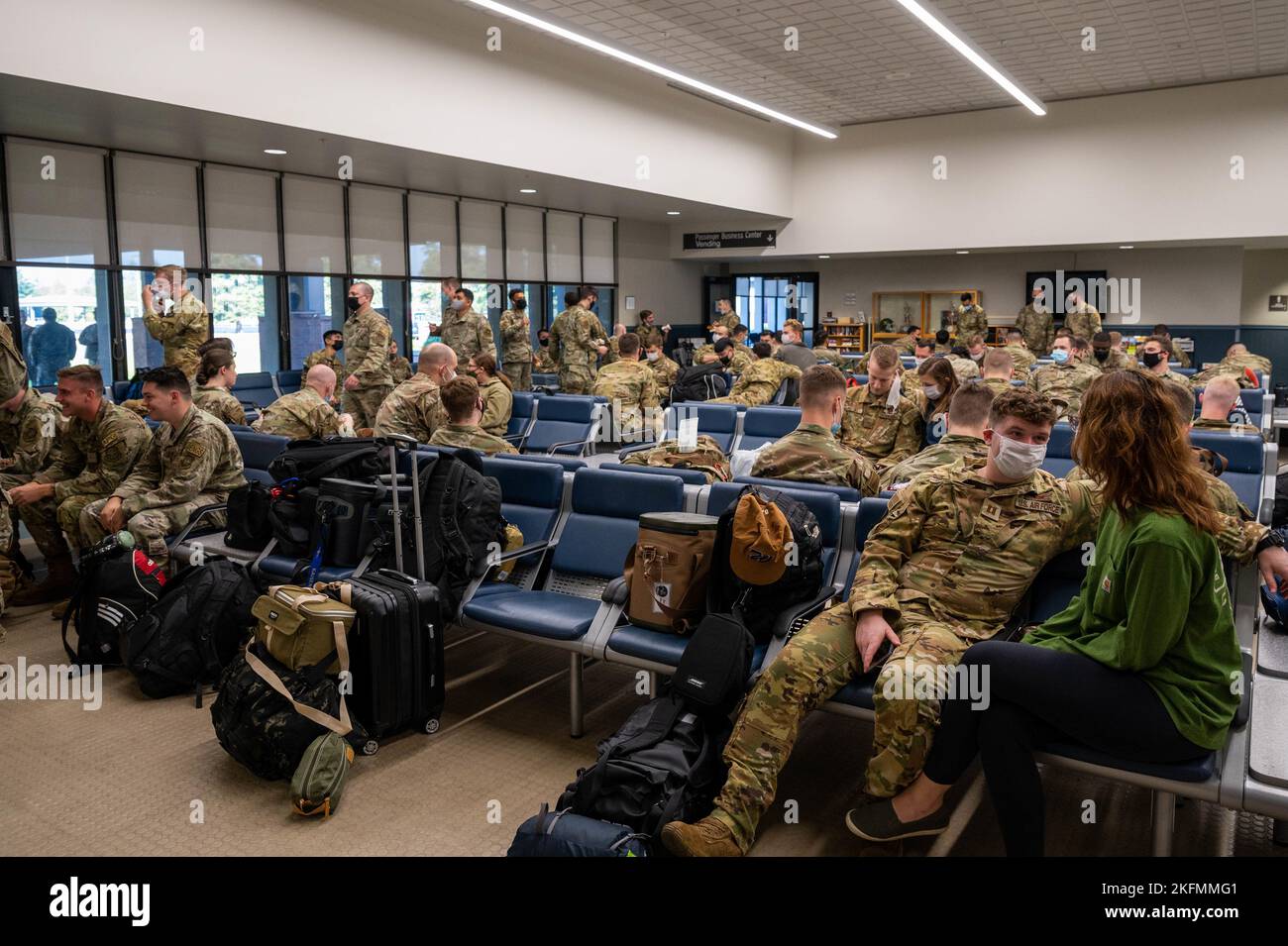 U.S. Air Force Airmen with the 62d Airlift Wing wait to depart for a ...