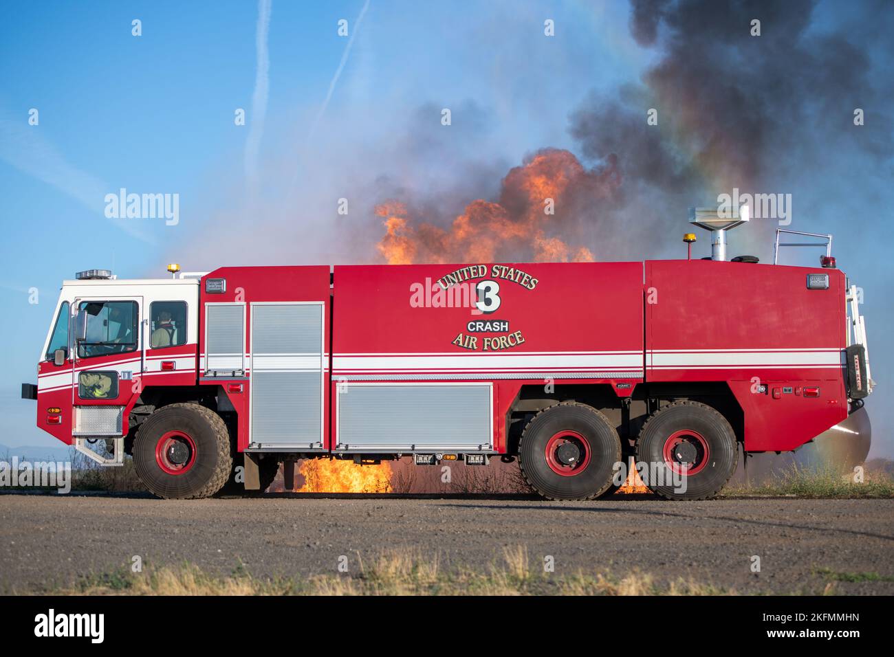 Firefighters from the 92nd Civil Engineer Squadron participates in live ...