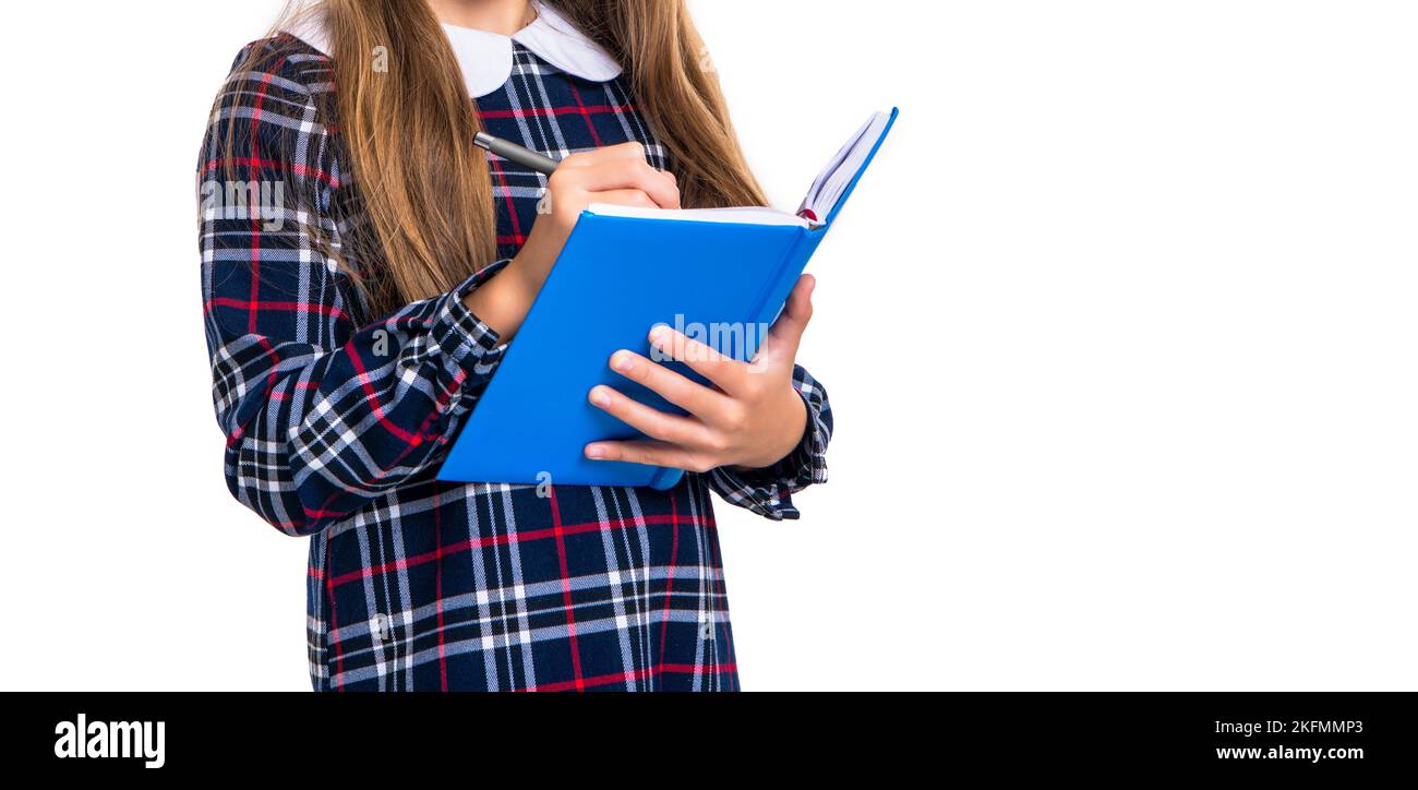 photo of school teen noting girl making notes, cropped view. school ...